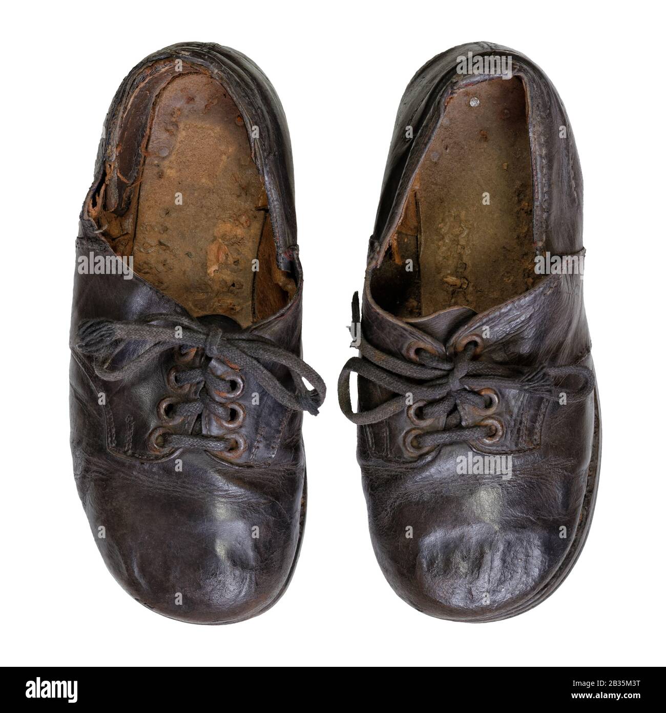 Vintage Handmade Children's Shoes on White: a pair of old handmade and ...