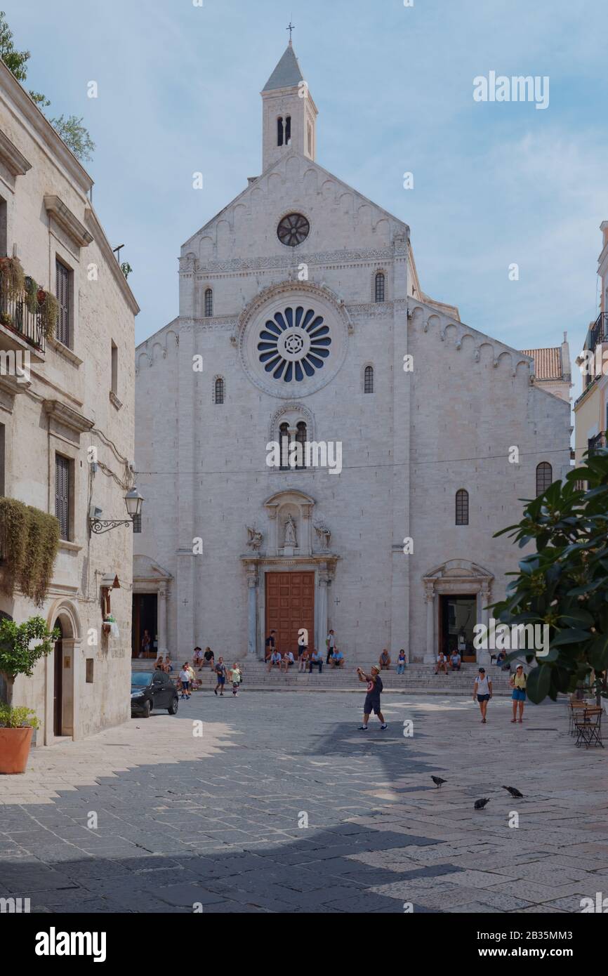 People at Bari Cathedral in Bari, Apulia, Italy. The cathedral was ...