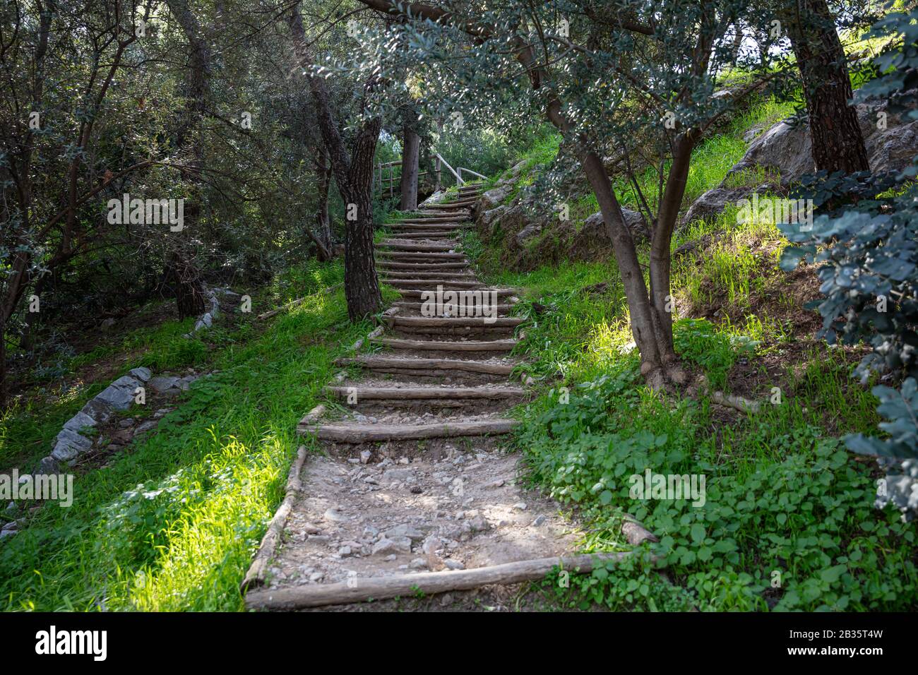 Wooden stairs at Filopappou hill, in Greece drive visitors from a ...