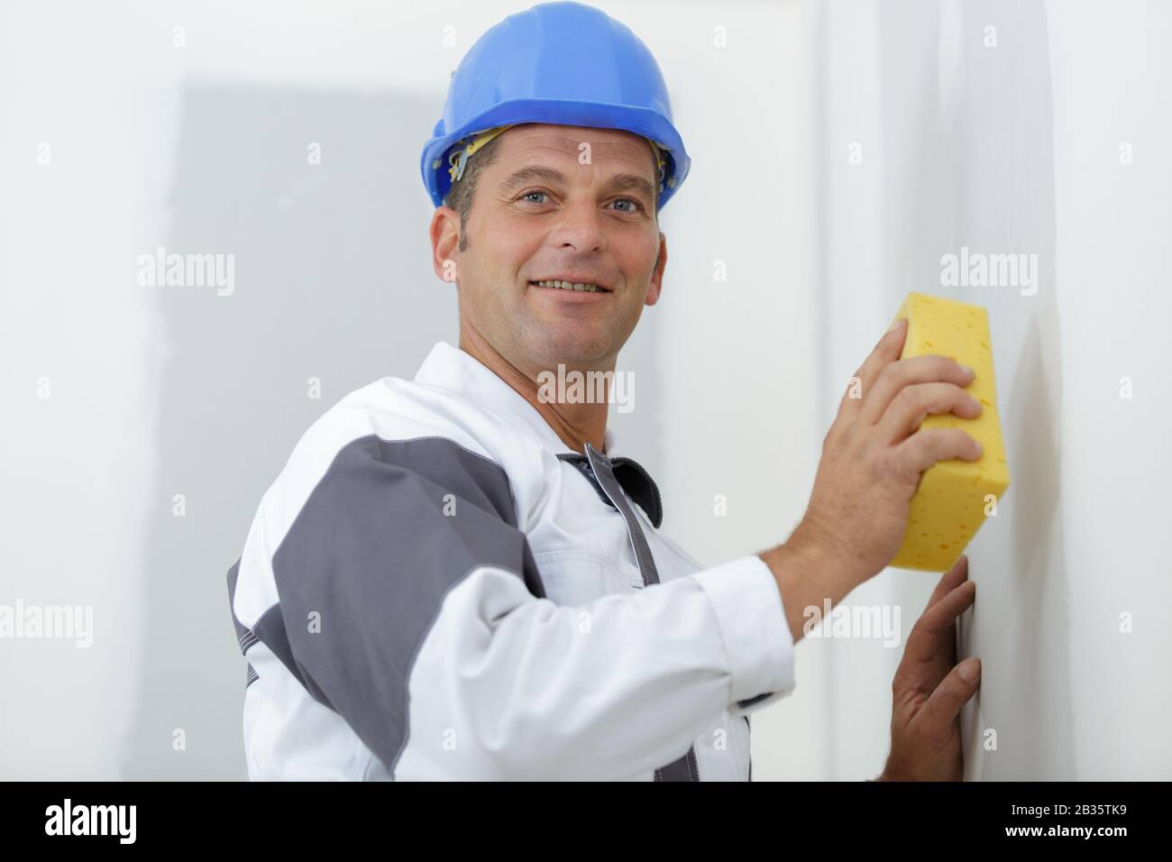 portait of a whitewasher man at work Stock Photo - Alamy