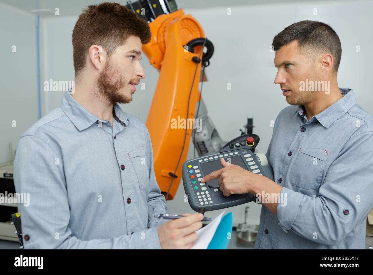 portrait of two mechanical engineers Stock Photo - Alamy