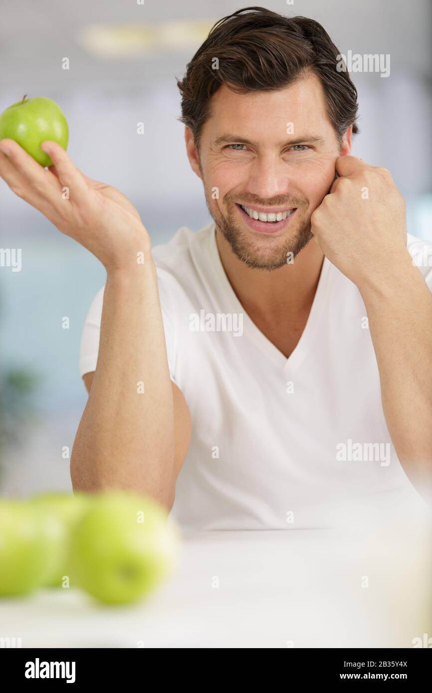 man with apple logo fruit Stock Photo - Alamy