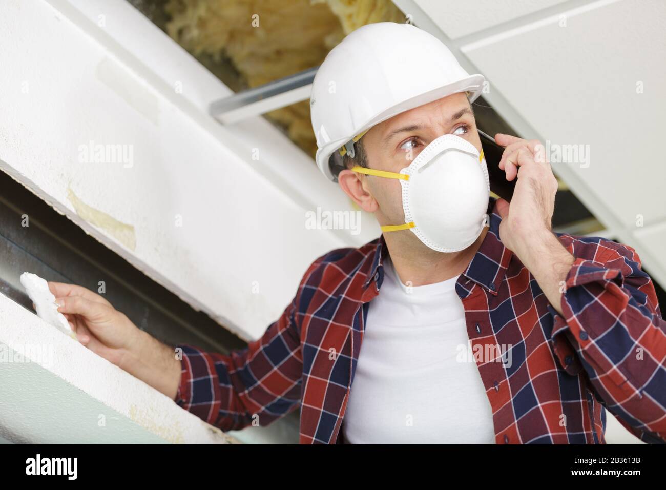 construction worker on the phone Stock Photo - Alamy