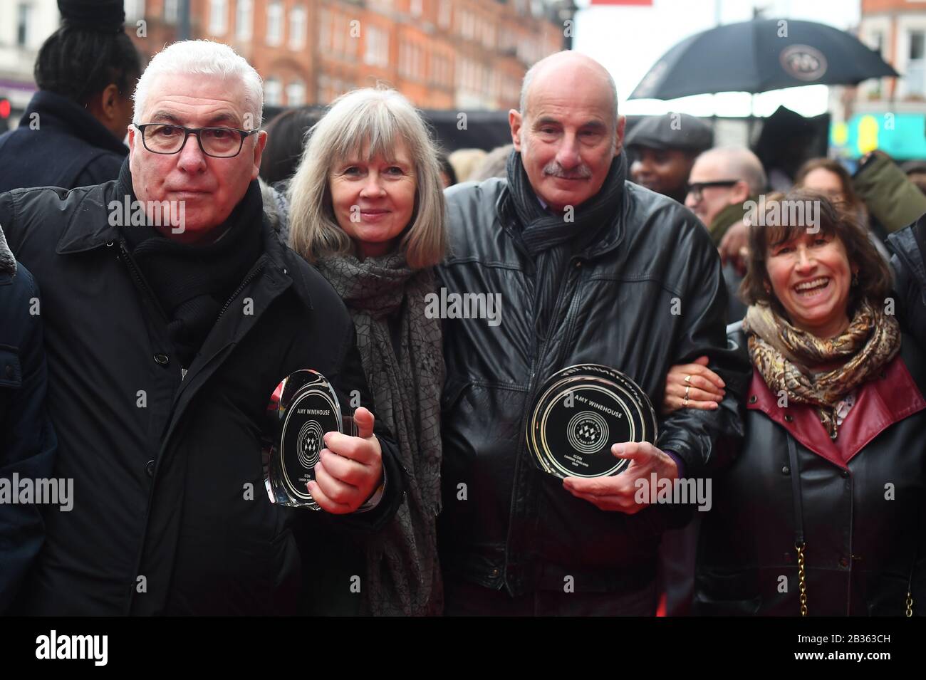 Amy Winehouse's father Mitch Winehouse (left) and his wife Jane and ...