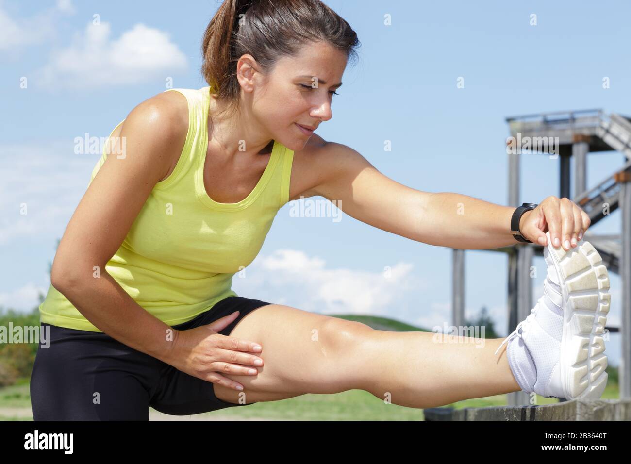 Beautiful woman stretches legs hi-res stock photography and images - Alamy