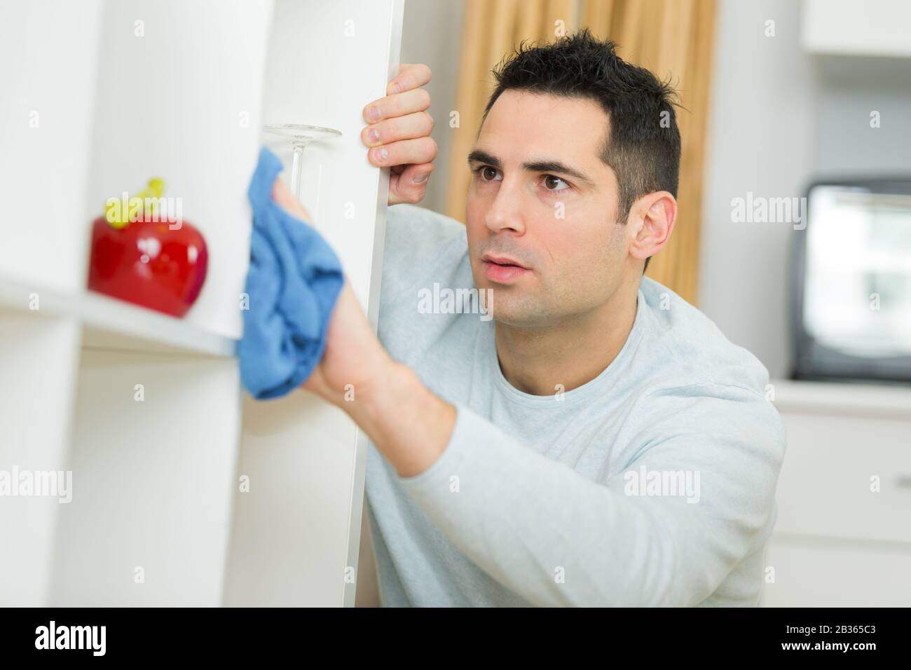 Man feather duster hi-res stock photography and images - Alamy