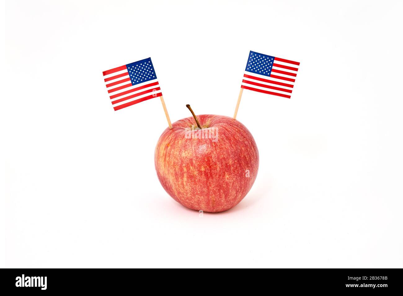 Red apple with two flags of USA isolated on white background. Greeting ...
