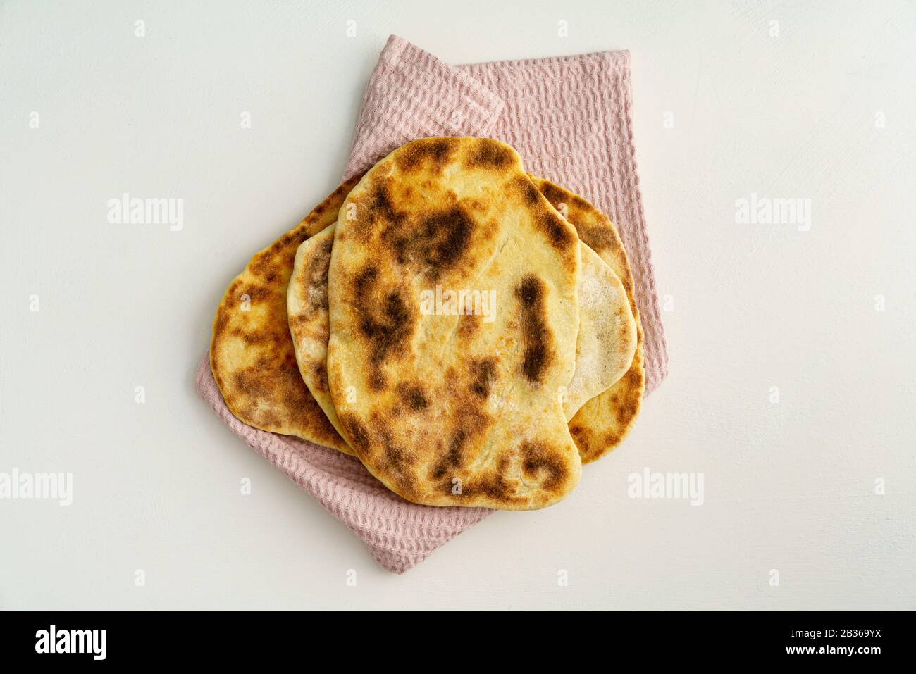 Indian naan flat bread hi-res stock photography and images - Alamy