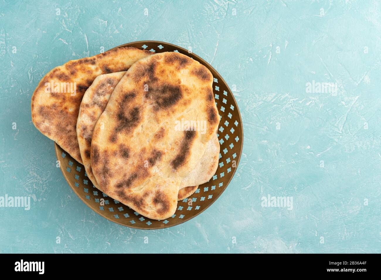 Indian naan flat bread hi-res stock photography and images - Alamy