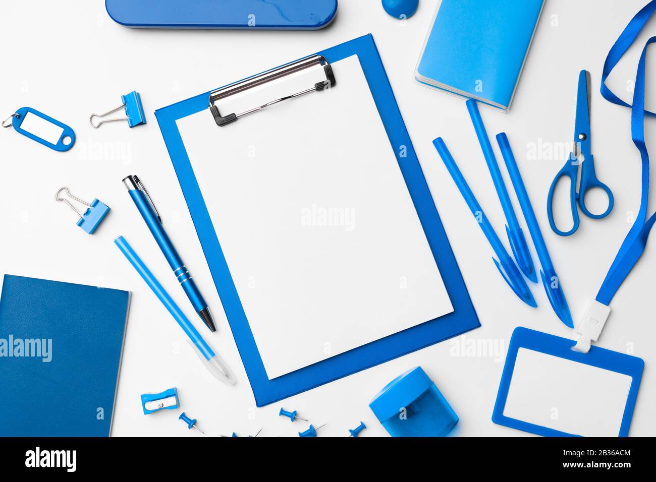 blue color stationery set as pattern with copy space on white ...