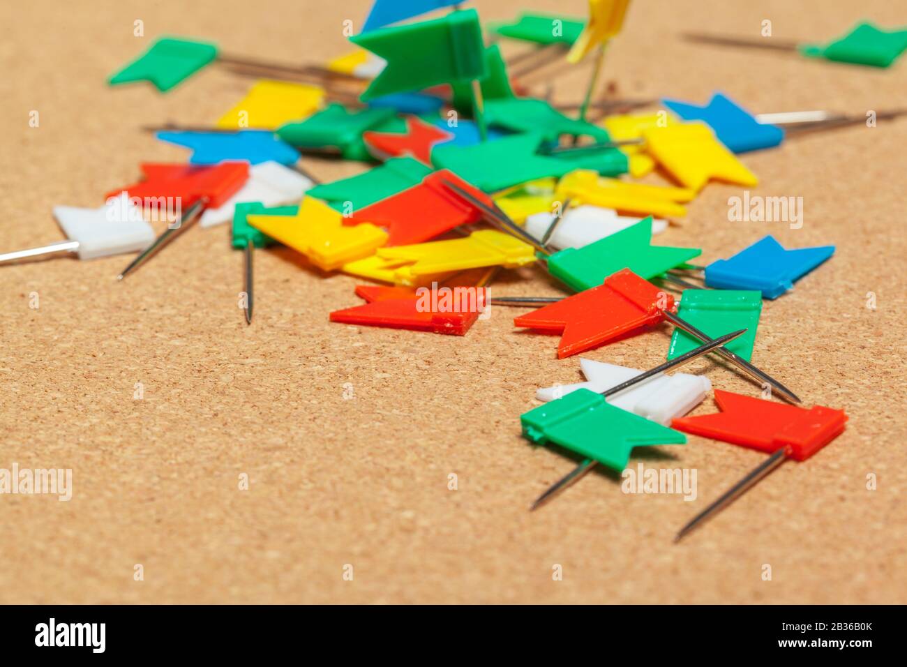 Mini flags thumbtacks over corkboard background close up Stock Photo ...