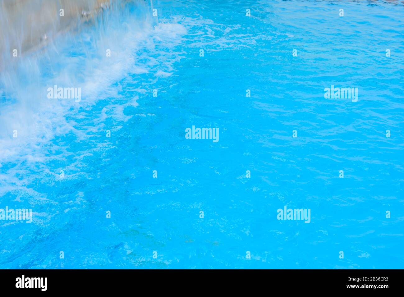 Stream of water on swimming pool Stock Photo - Alamy