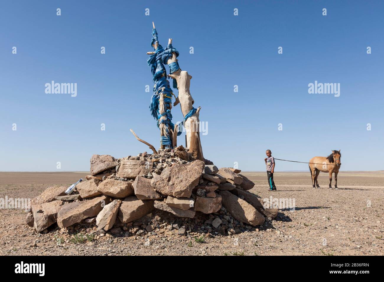 Mongolia, Dundgovi province, near Mandalgovi, young boy and his horse ...