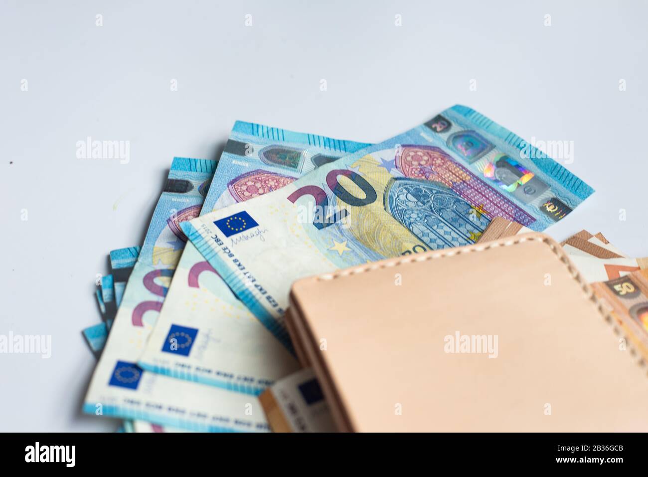 Leather wallet with euro money bill on white background financial ...