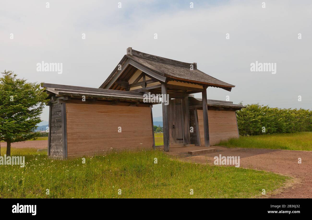 Reconstructed Eastern Gate and clay wall (tsuijibei) of Shiwa Castle in ...