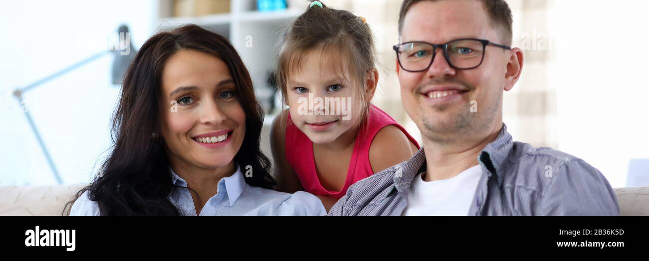 Parents spending time with kid Stock Photo - Alamy