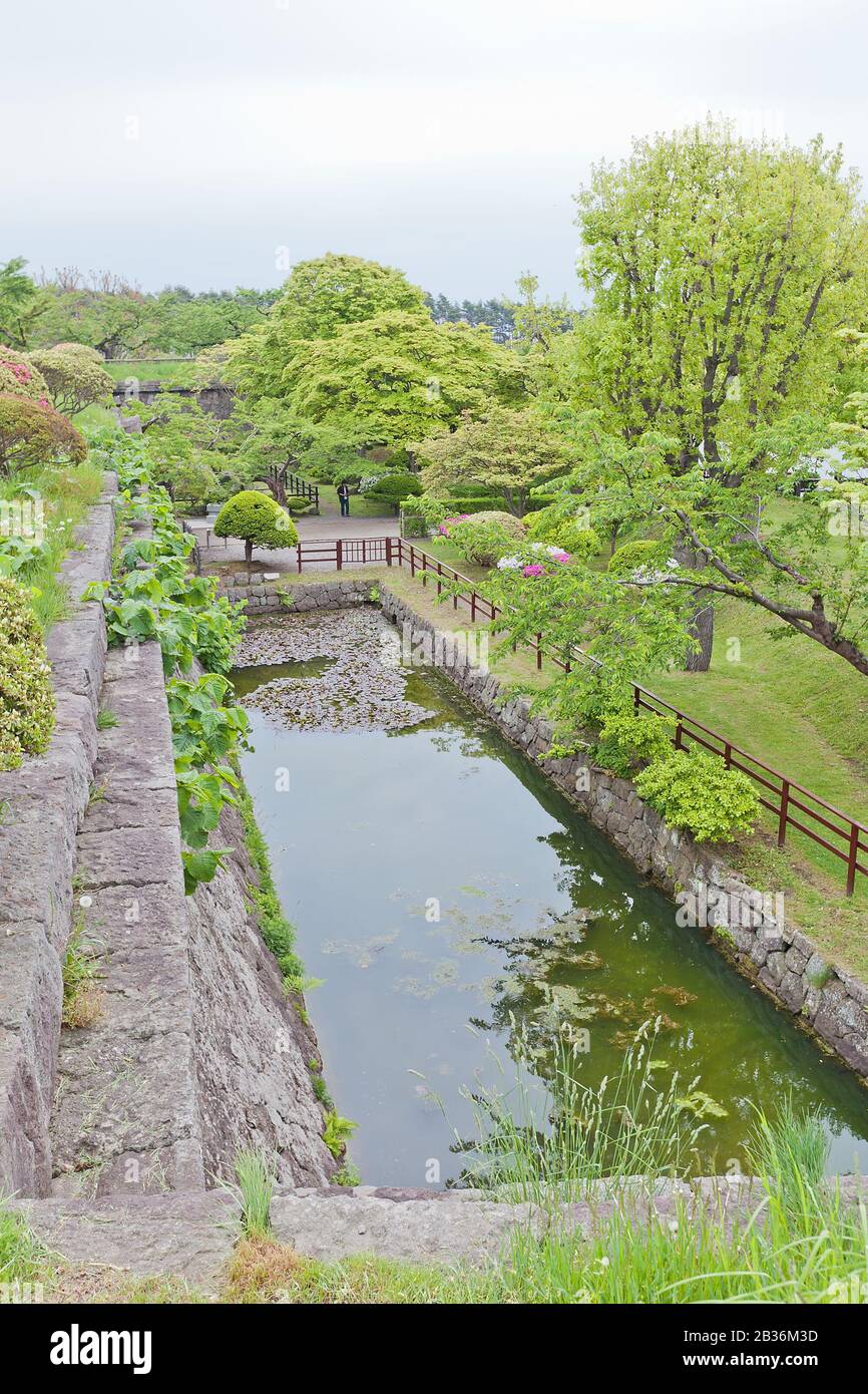 Stone walls (ishigaki) and moat of Goryokaku Fort in Hakodate, Hokkaido ...