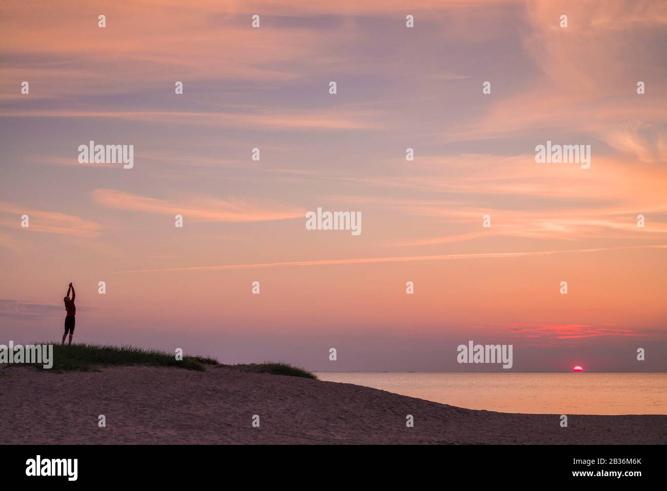 Sweden, Scania, Malmo, Riberborgs Stranden beach area, woman ...