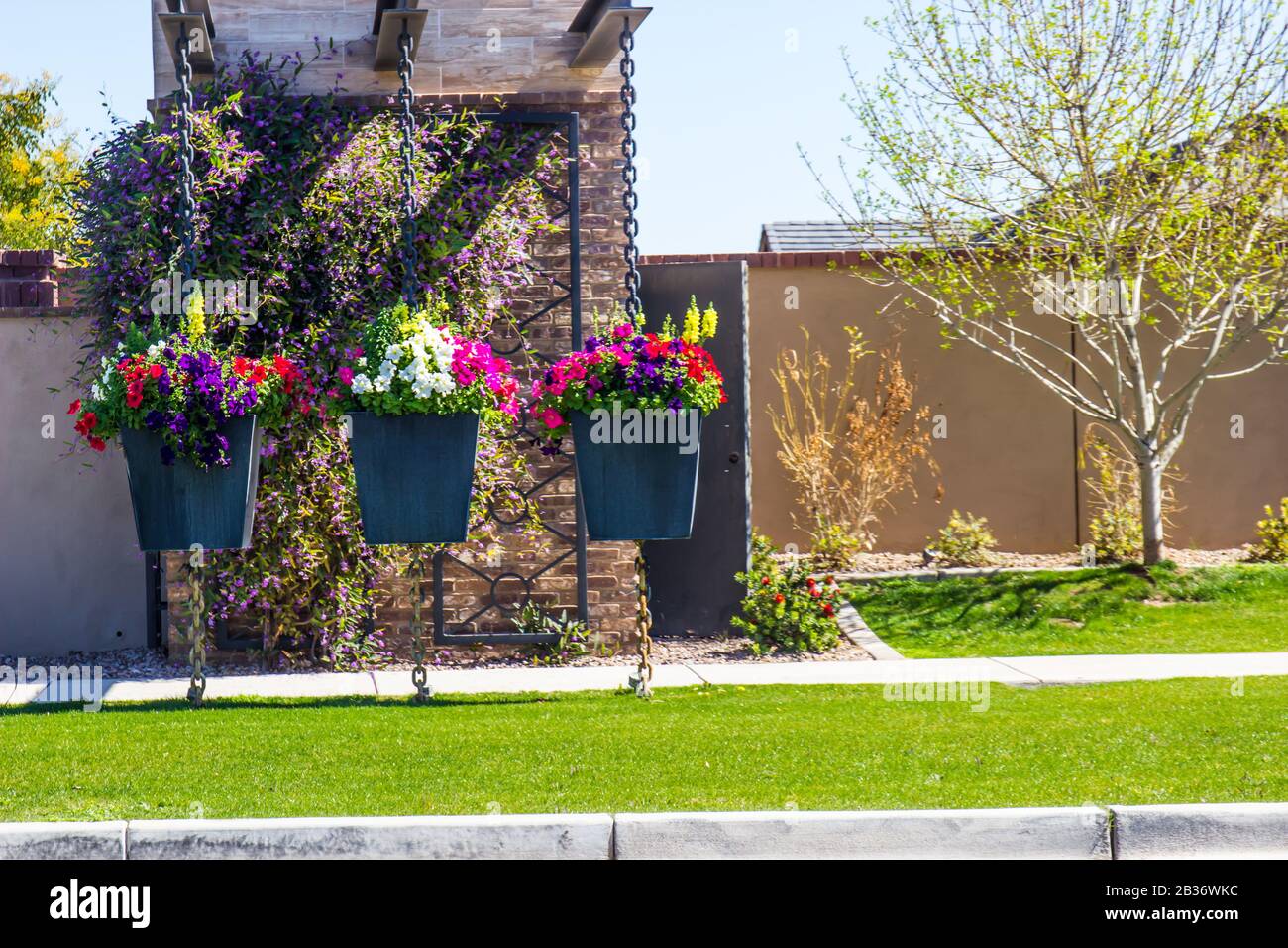 Unique Flower Containers Suspended By Heavy Chains Stock Photo - Alamy