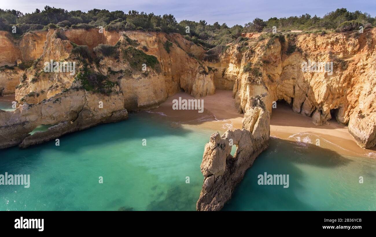 Aerial view of cliffs blue sea water beach Boiao, Portimao Portugal ...