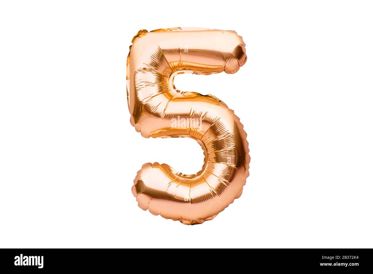 Number 5 five, made of golden inflatable helium balloon. Gold foil ...