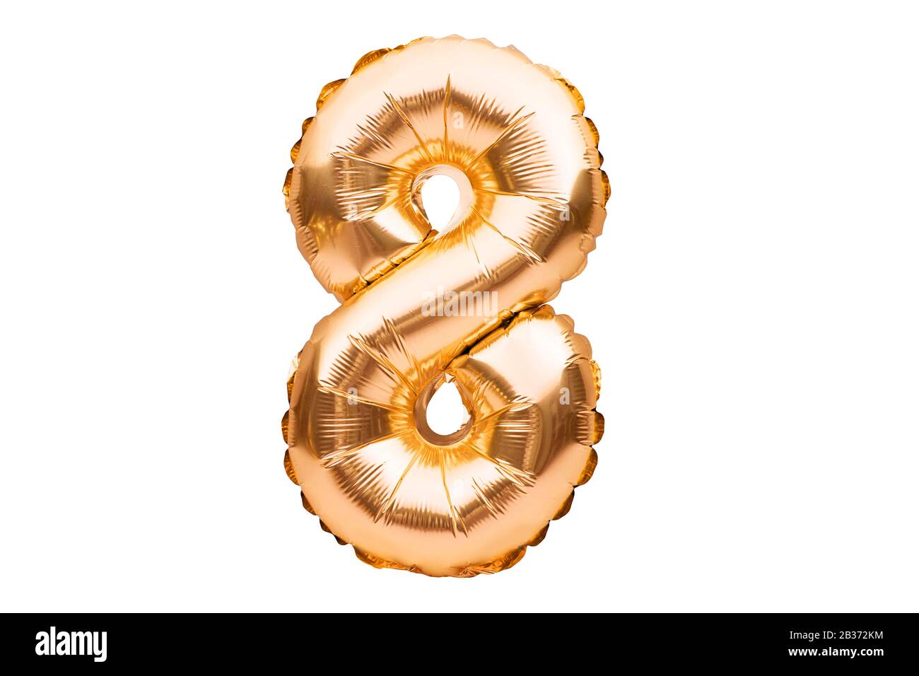 Number 8 eight, made of golden inflatable helium balloon. Gold foil ...