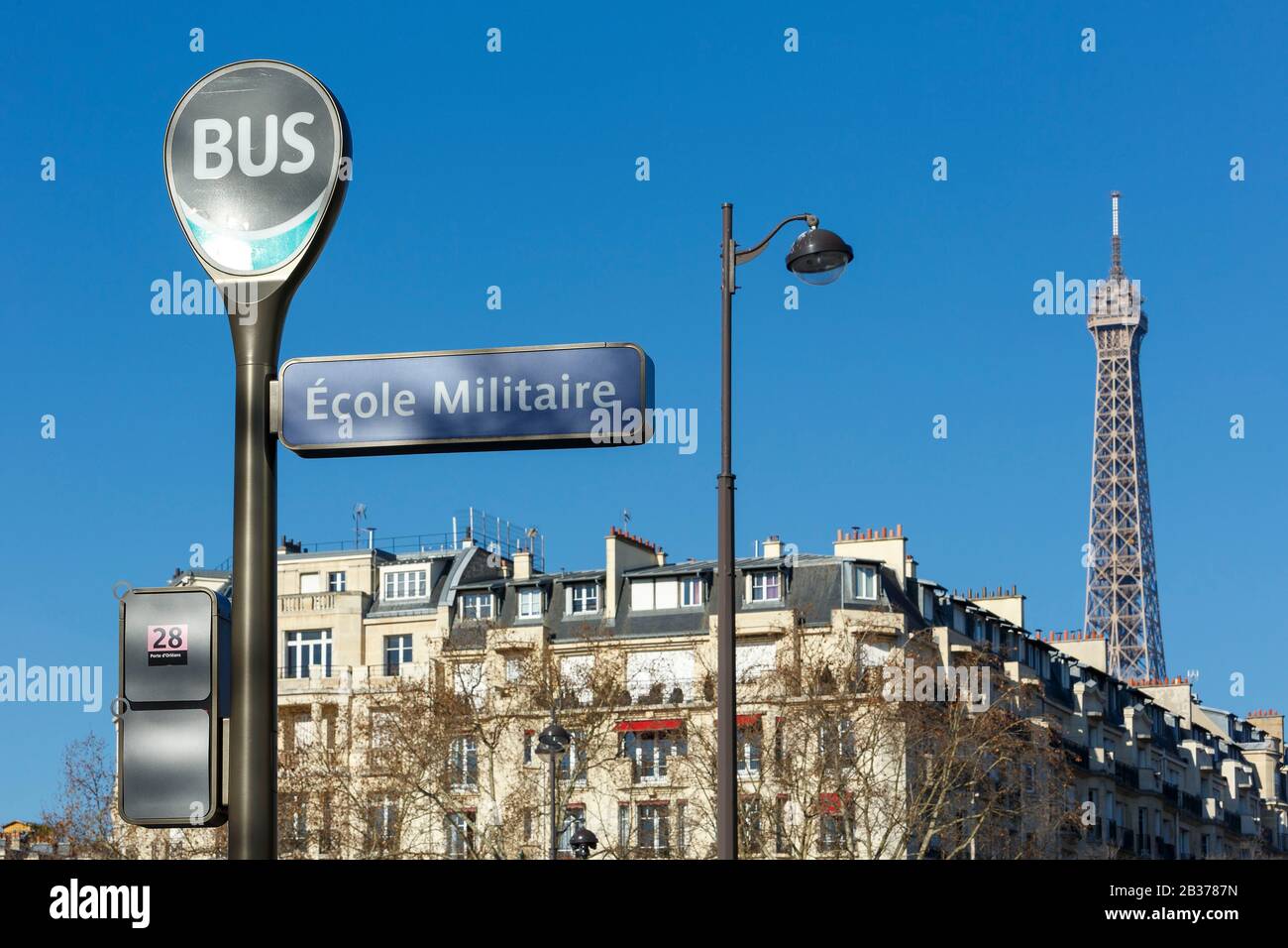 France, paris, bus stop, facade of an apartment building and Eiffel ...