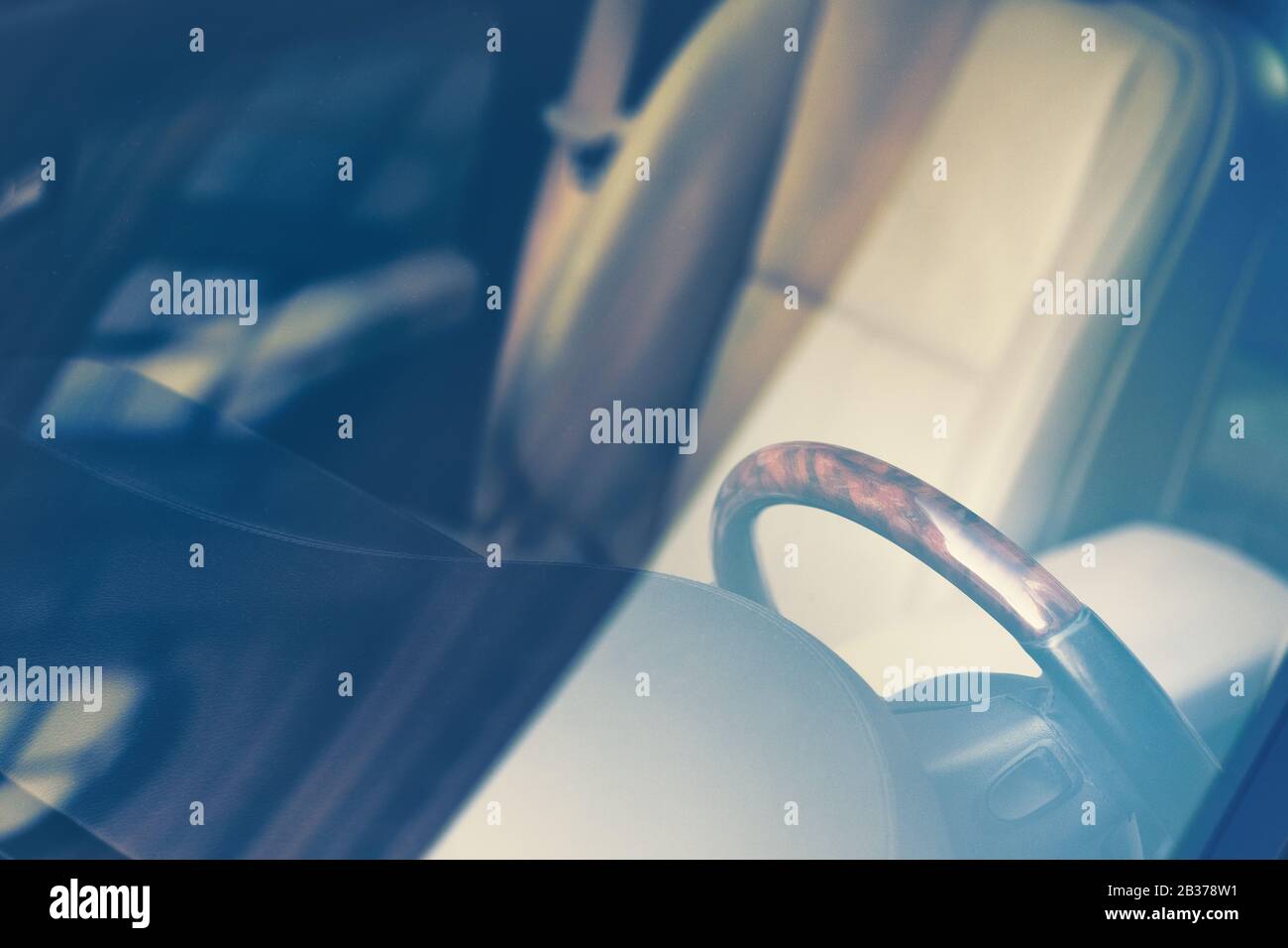 Car interior through windshield with reflections Stock Photo - Alamy