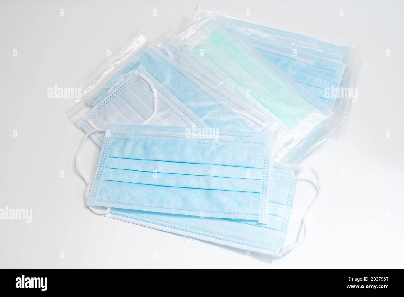 Surgical mask with rubber ear straps. Typical 3-ply surgical mask to ...