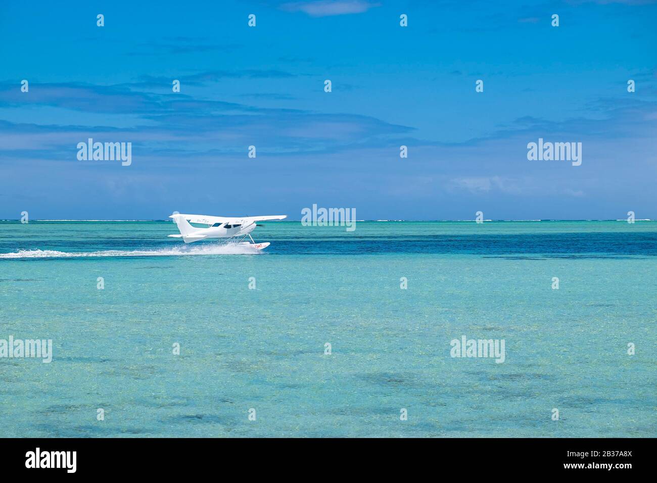 Mauritius, Riviere Noire district, Prairie beach, flying in a seaplane ...