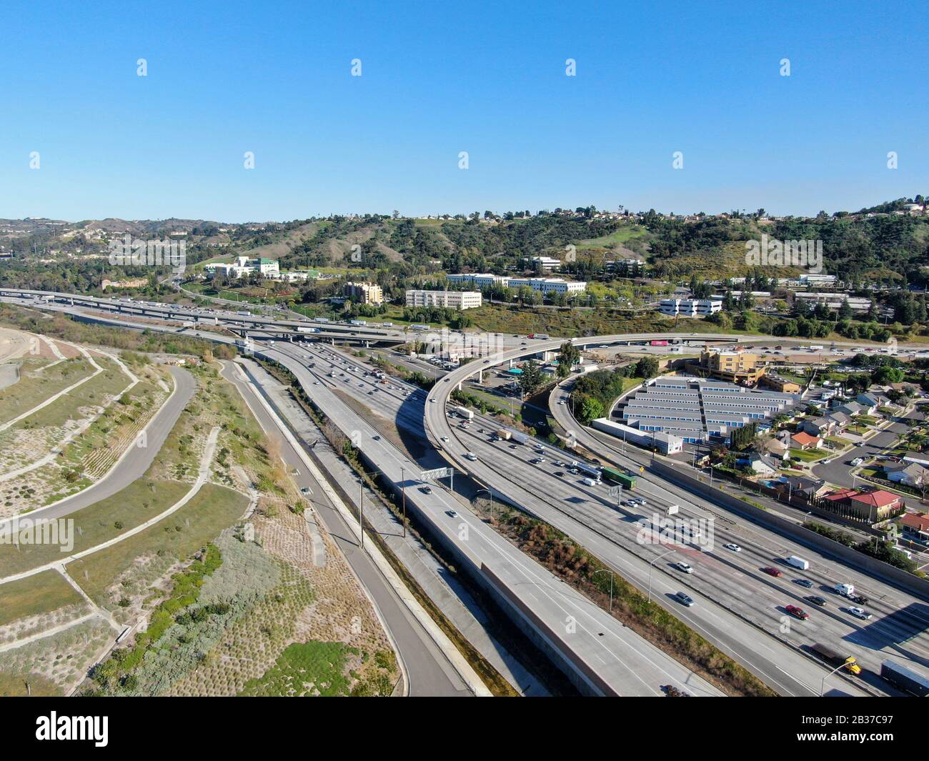 Aerial view of highway with traffic surrounded by houses in Diamond Bar ...