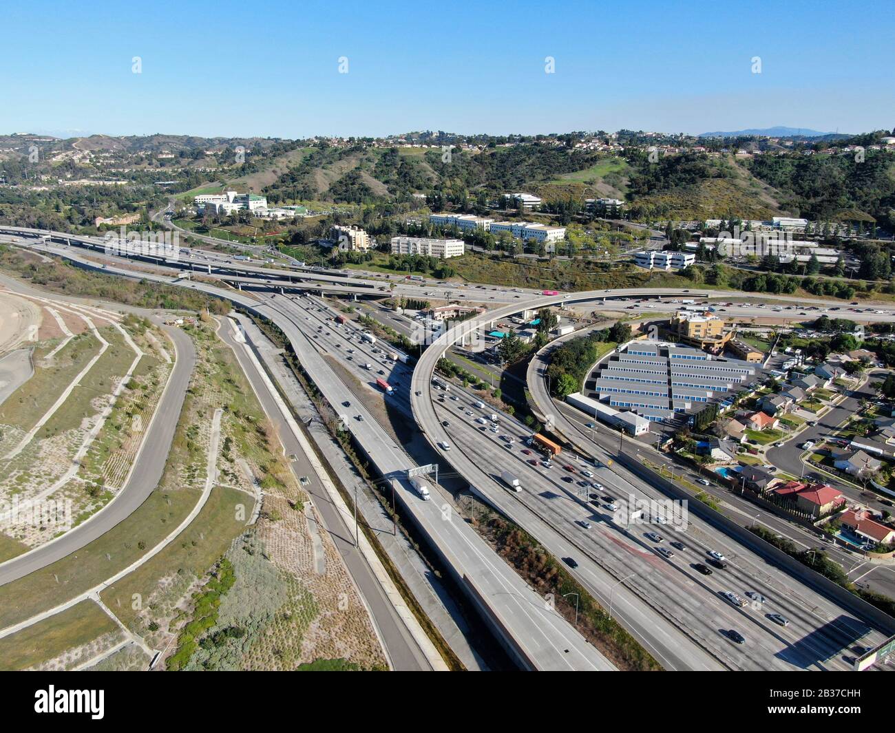 Aerial view of highway with traffic surrounded by houses in Diamond Bar ...
