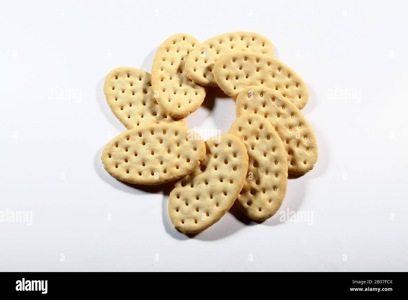 group of crackers shaped like a flower on a white background Stock ...