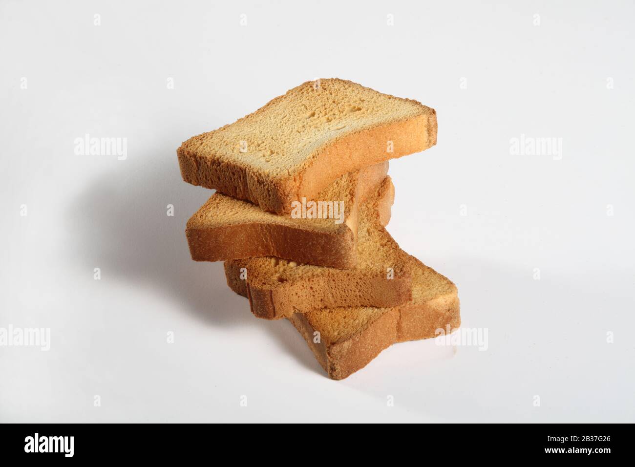 four slices toast viewed from above on a white background Stock Photo ...