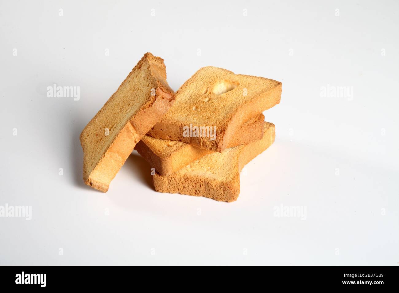 group of four slices toast viewed from above on a white background ...