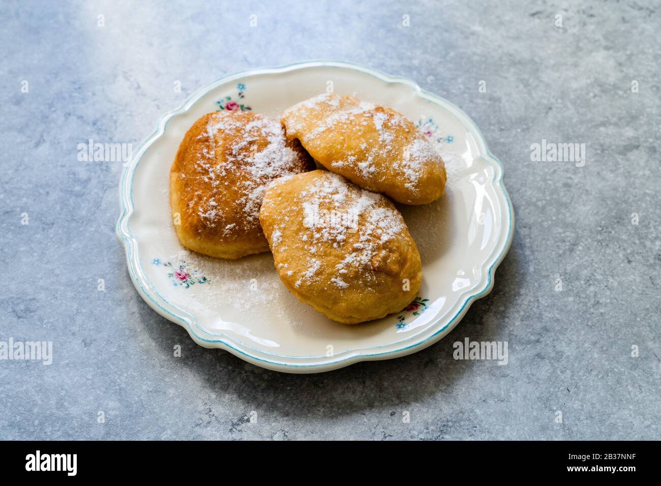 Mandazi is a slightly sweet East African Street Food; spicy, airy yeast ...