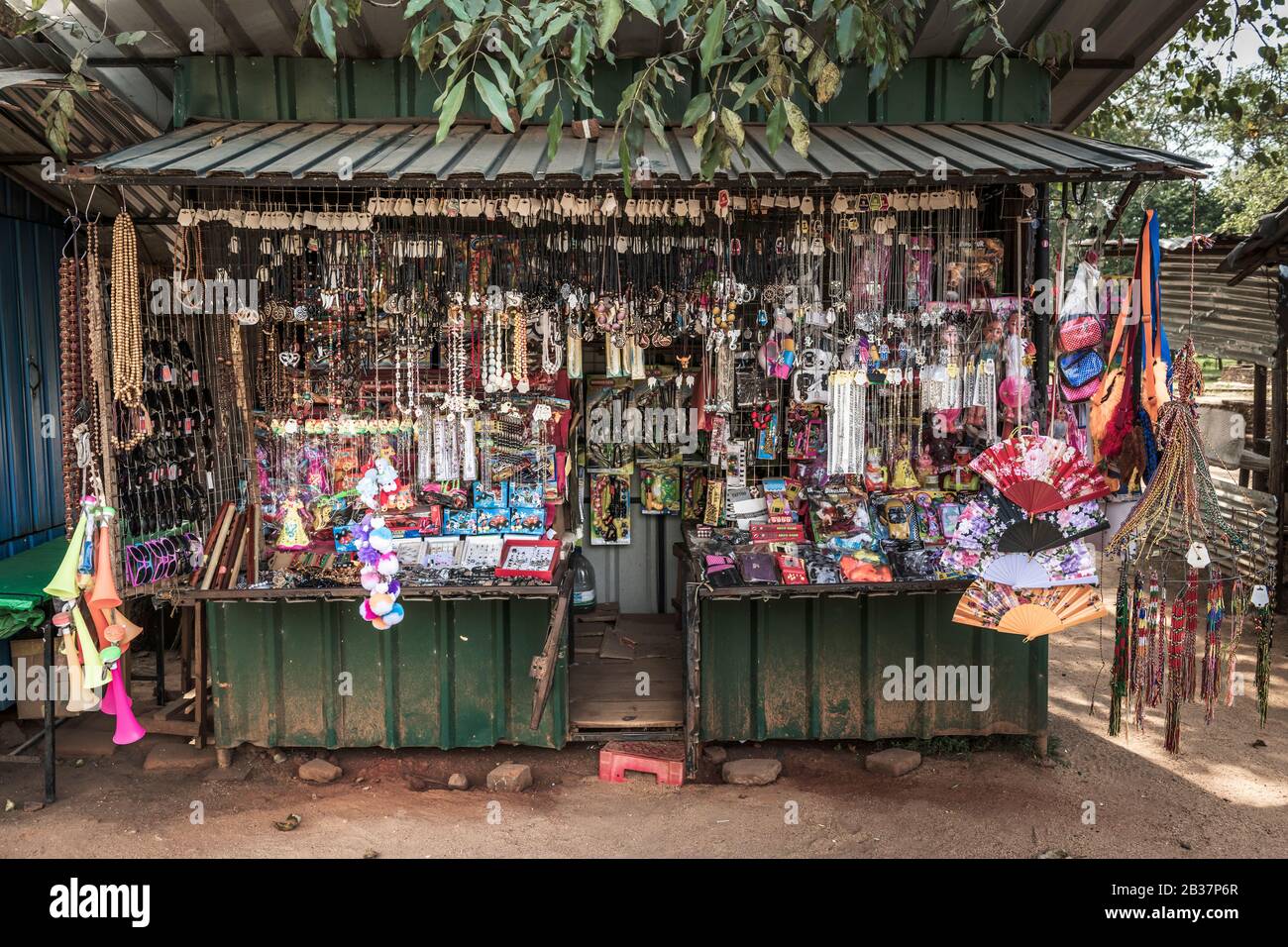 A colourful market stall selling gifts and trinkets to visitors at a ...