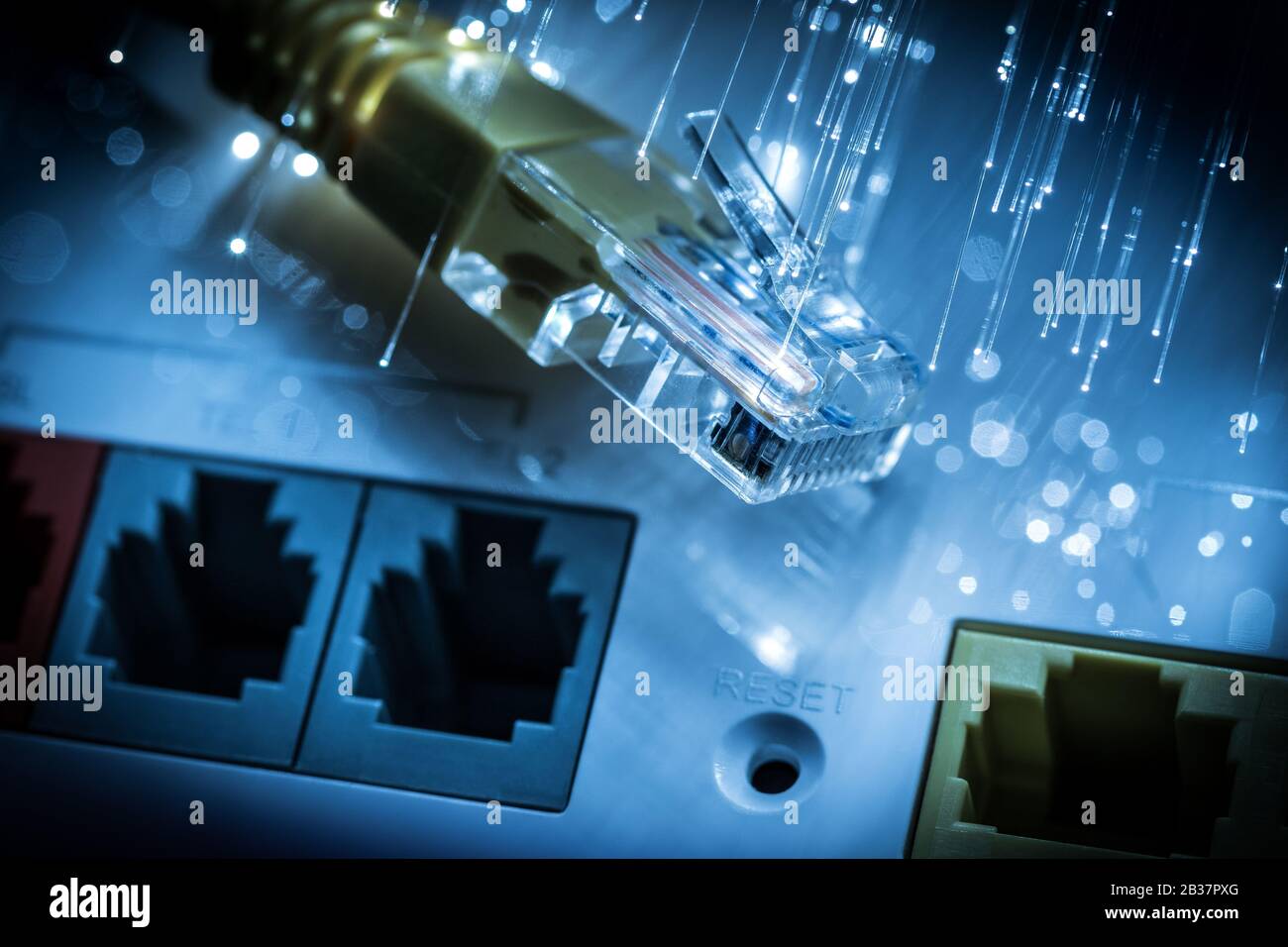 router with network cable and optical fiber Stock Photo - Alamy
