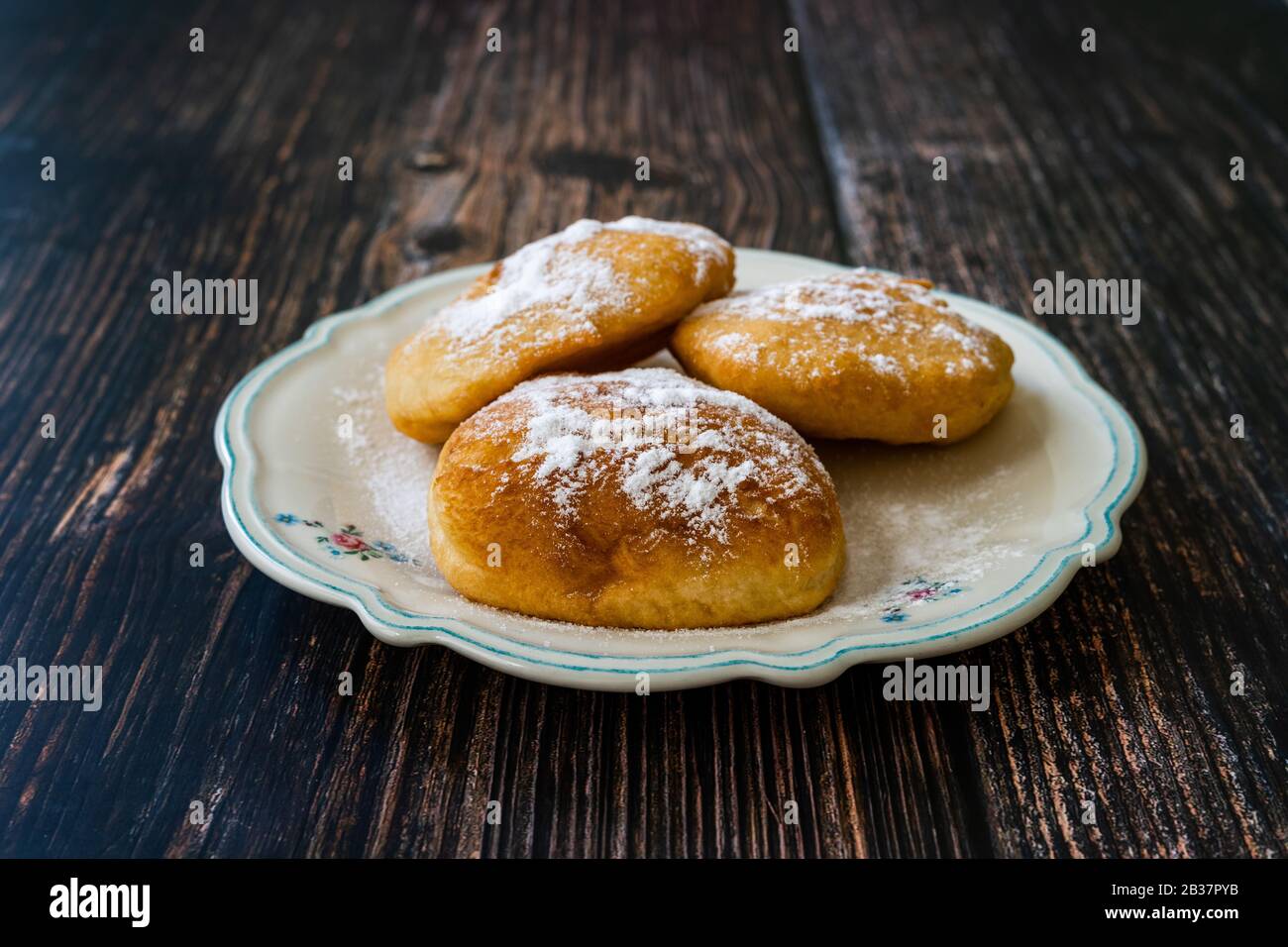 Mandazi is a slightly sweet East African Street Food; spicy, airy yeast ...