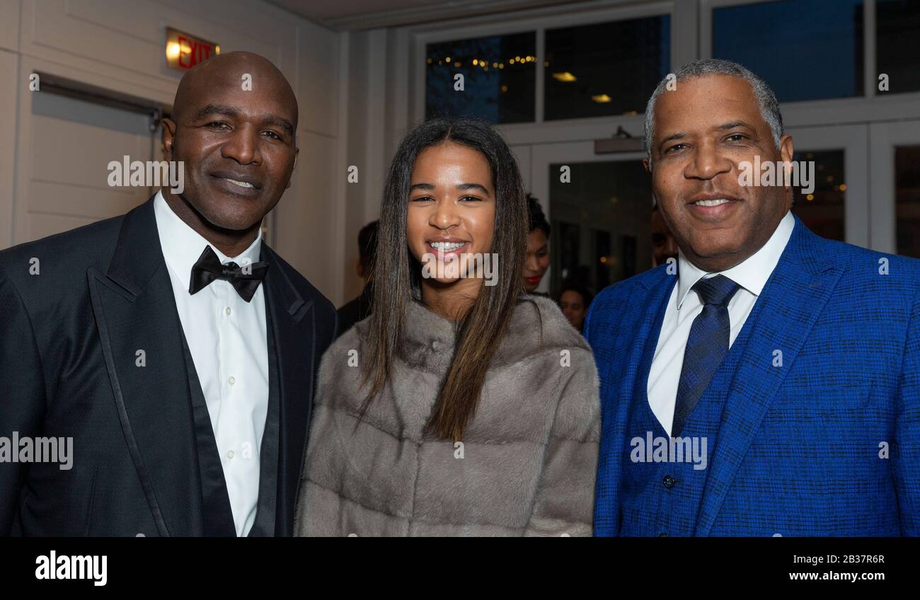 New York, NY - March 3, 2020: Evander Holyfield, Eliana Smith, Robert F ...