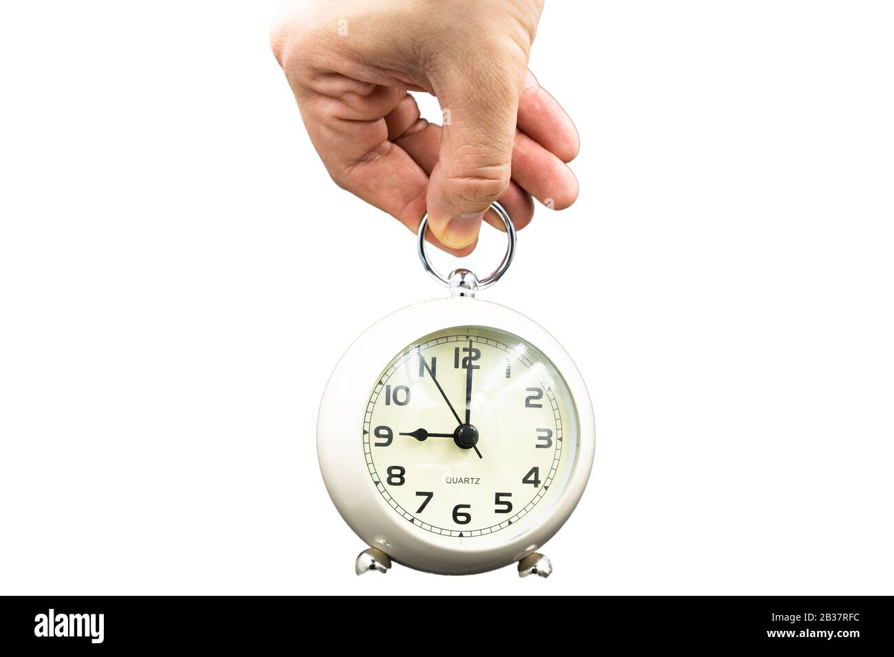 hand holding alarm clock Stock Photo - Alamy