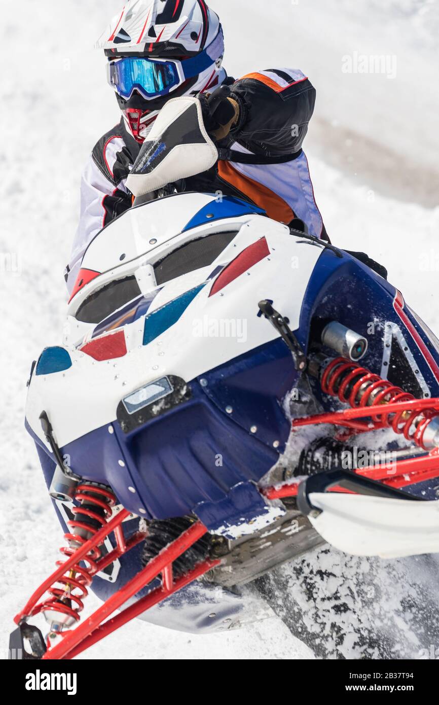 man soaring in snowmobiles competition Stock Photo - Alamy