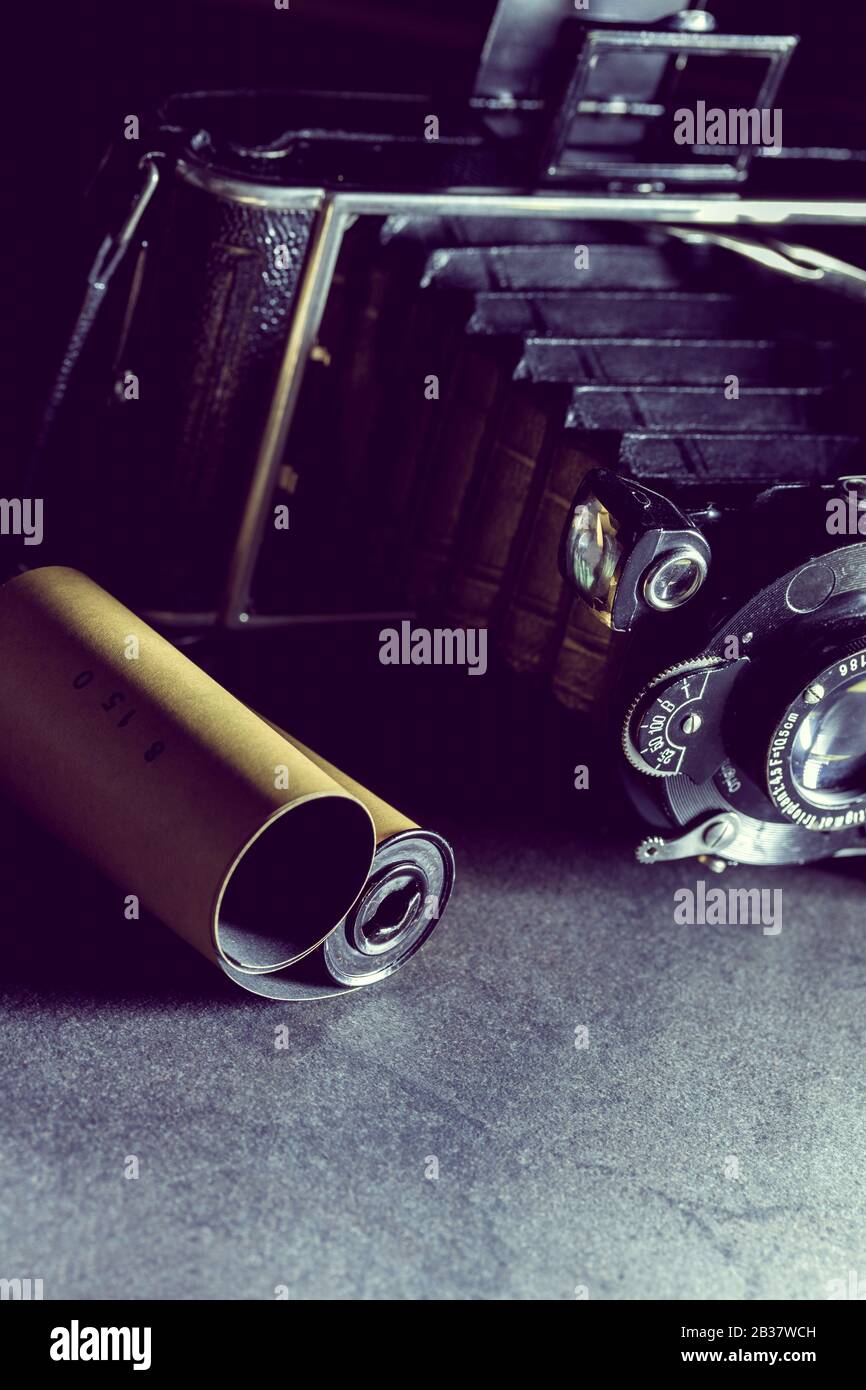 ancient camera with film - close up Stock Photo - Alamy