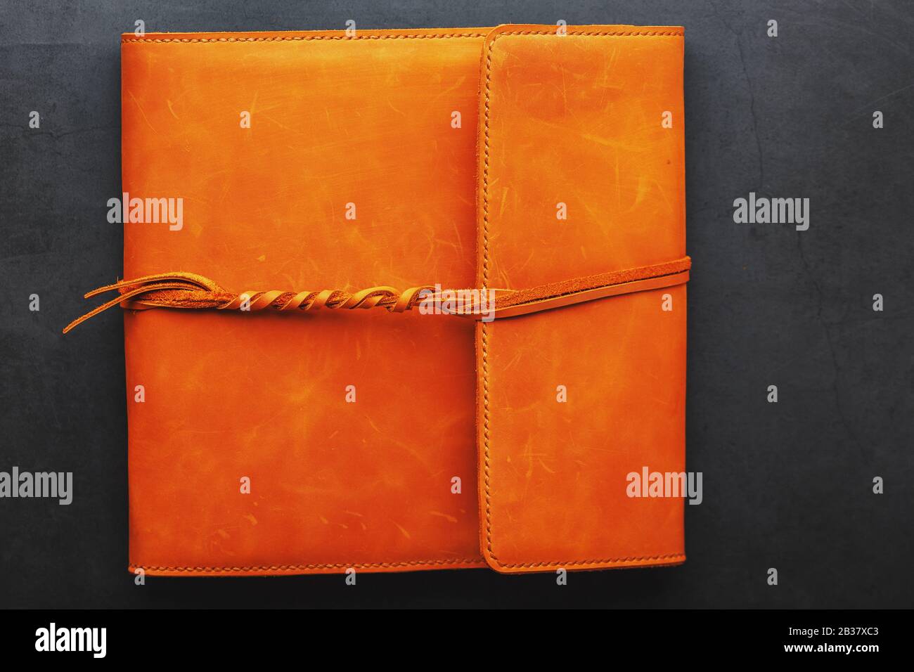 The album cover is made of brown genuine leather, handmade on a black ...