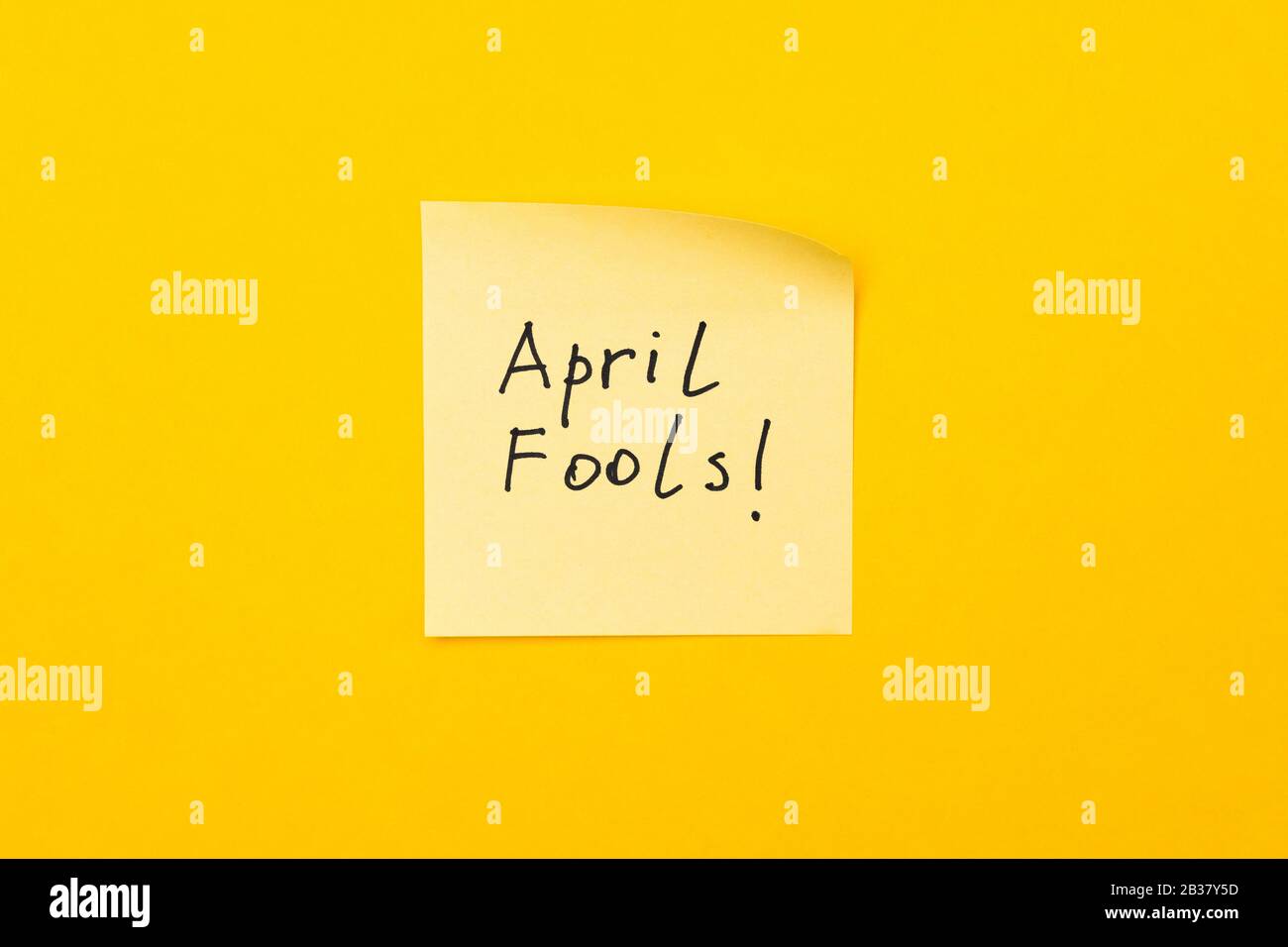 april fools day reminder on yellow sticky note. be aware and do not let ...
