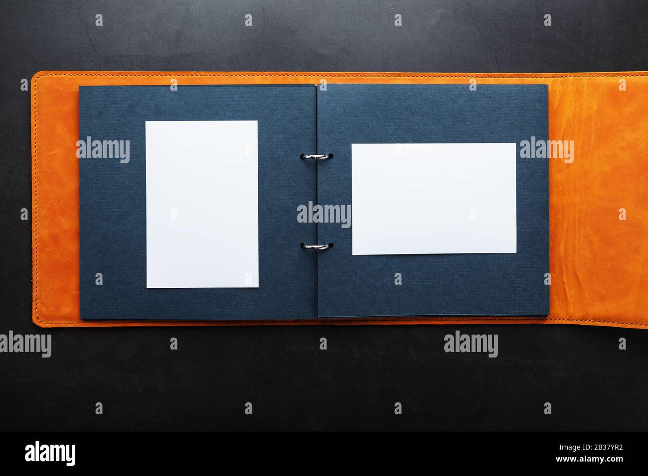 Photo album with empty space for photos, white frames on black paper ...