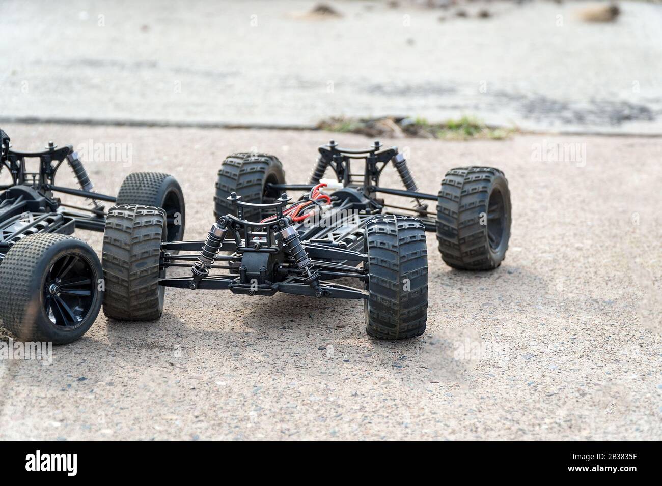 Disassembled RC model racing cars. Model cars without top. Radio ...