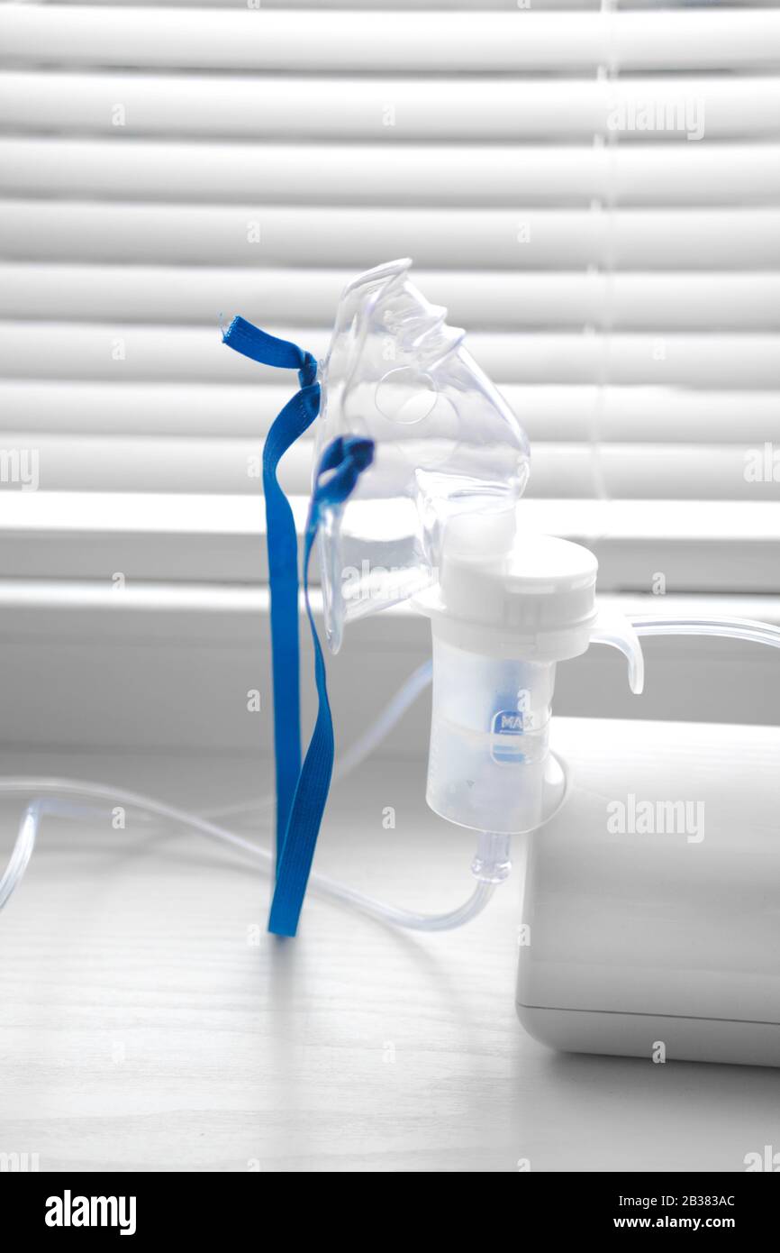 Ultrasonic inhaler or nebulizer on white background. Respiratory ...