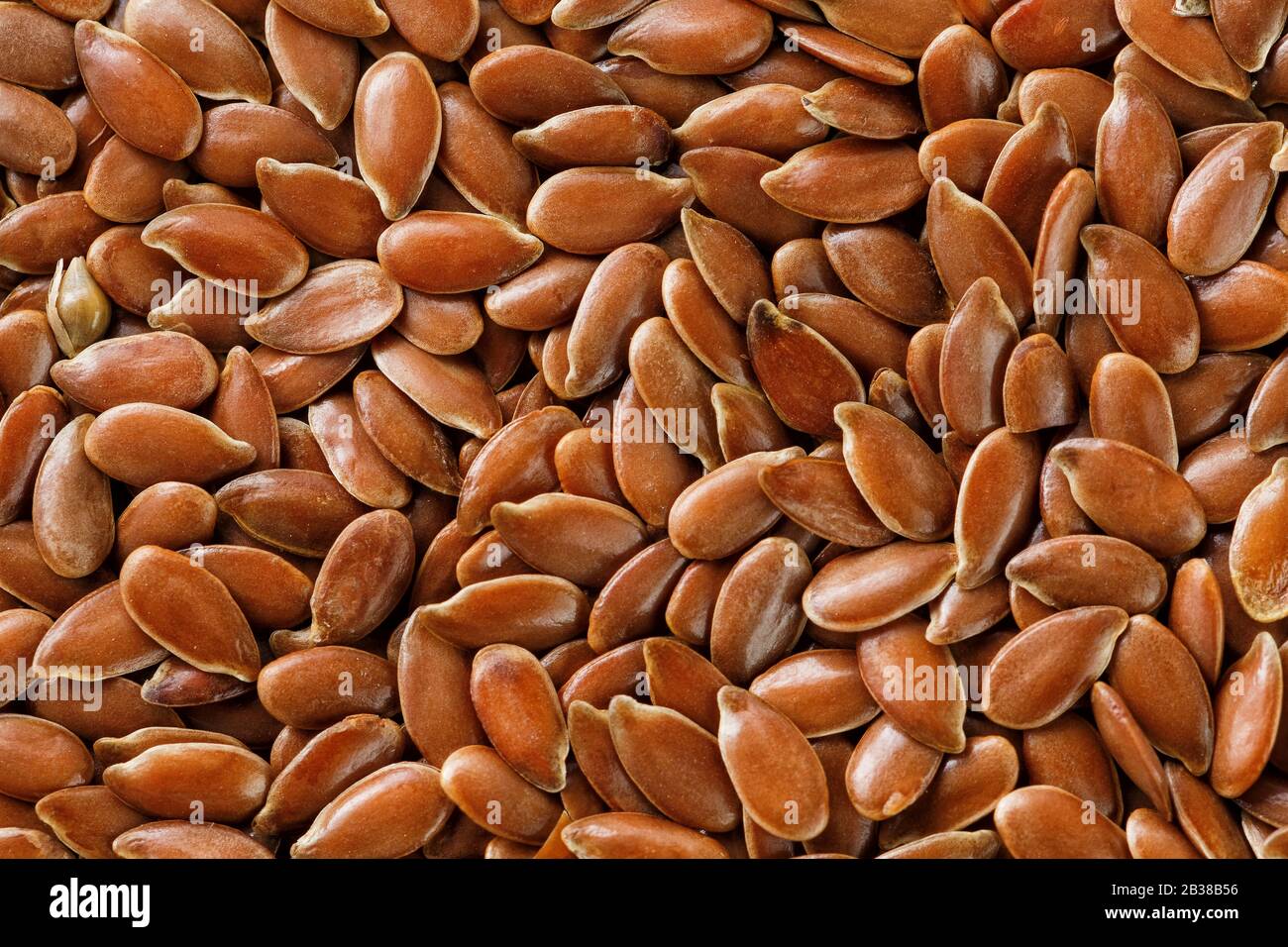 Background texture of seeds of dark brown flax Stock Photo - Alamy