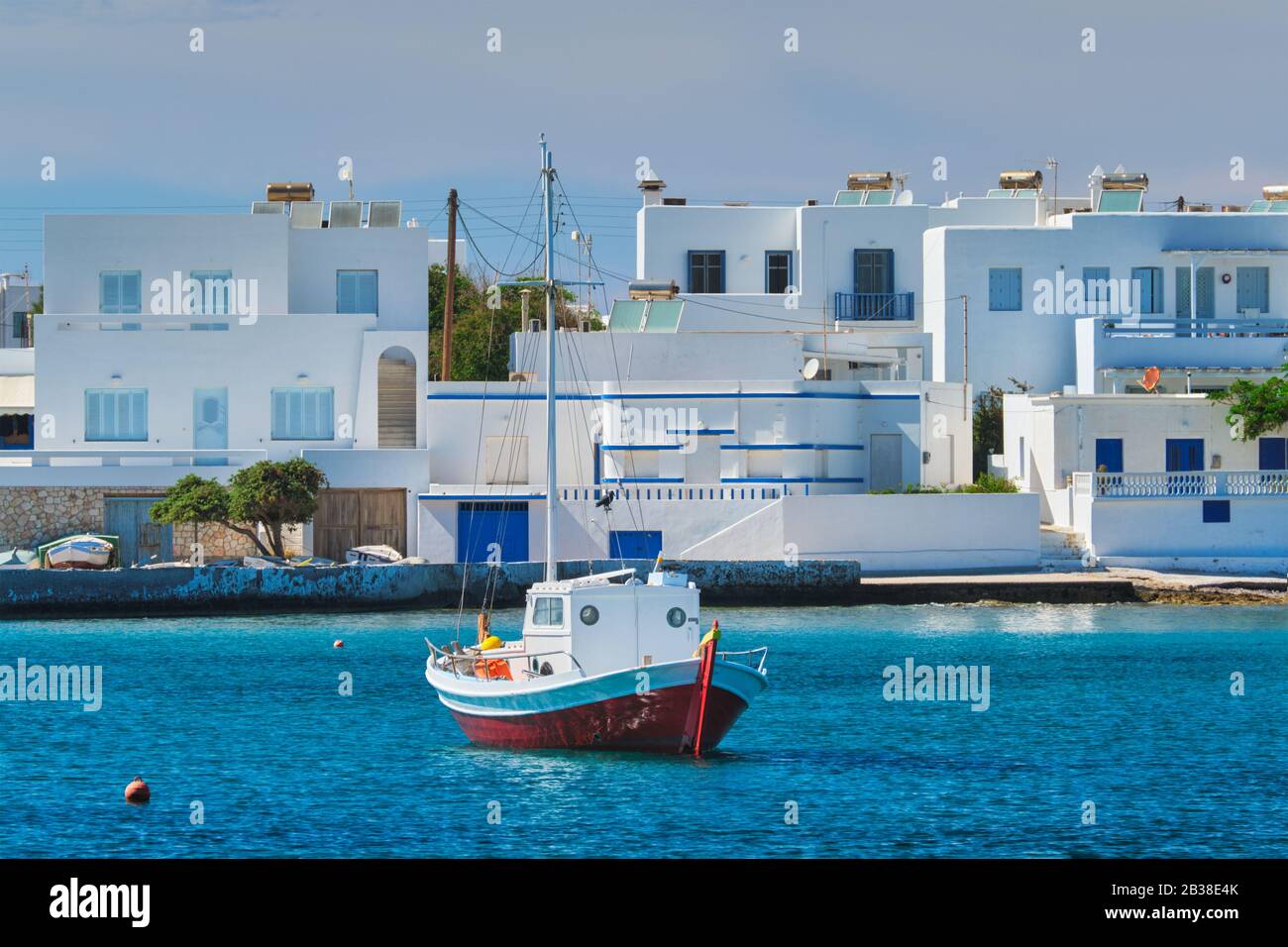 The beach and fishing village of Pollonia in Milos, Greece Stock Photo ...